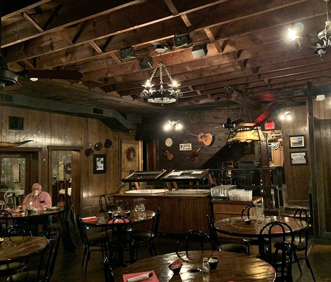 Exposed wooden beams, rustic walls, and guitars create an atmosphere that feels like Virginia's version of a cozy Alpine lodge.