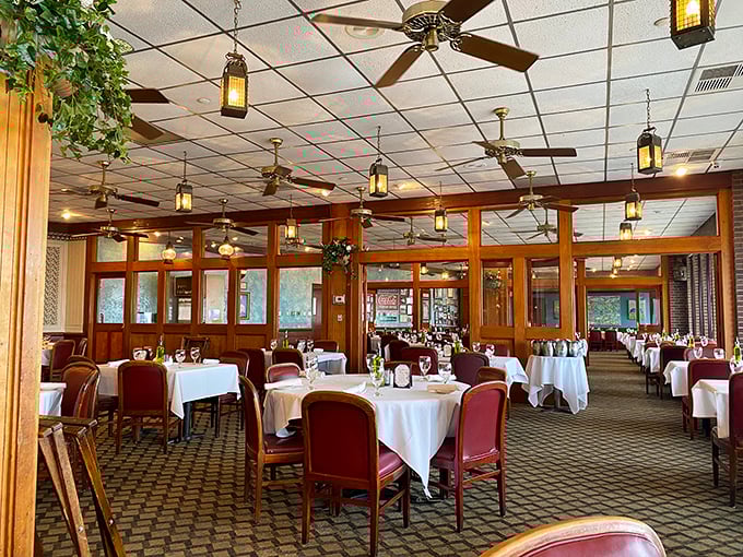 White tablecloths, warm wood paneling, and ceiling fans that have witnessed decades of celebrations&mdash;this dining room feels like coming home to the sea.