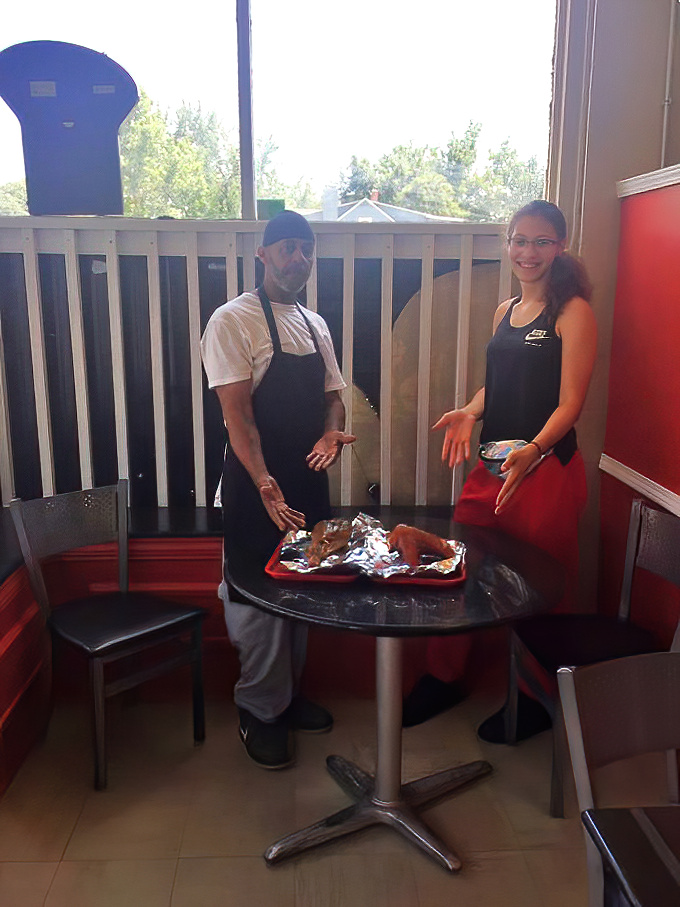 Where the magic happens! The staff's practiced hands transform simple ingredients into the golden-fried delicacies that keep Kansans coming back for more.