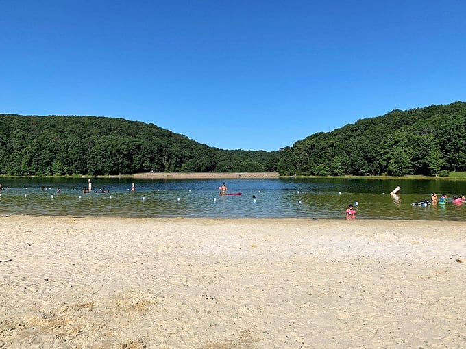 Summer sanctuary: crystal-clear waters nestled between verdant mountains create Maryland's answer to a private beach getaway.