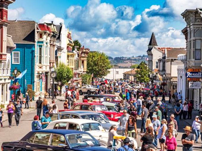 Main Street during festival time&mdash;where vintage automobiles meet Victorian architecture in a celebration that transforms Ferndale into California's most photogenic block party.