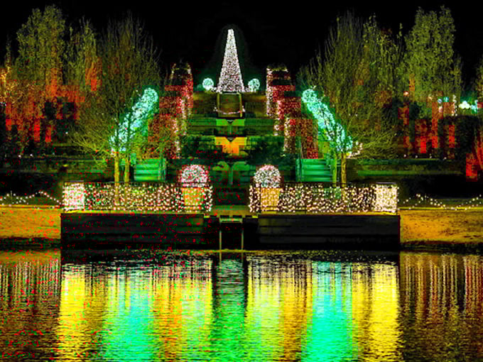 When night falls, the garden transforms into an electric dreamscape where reflections double the magic and make you wonder if you've stumbled into a fairytale.