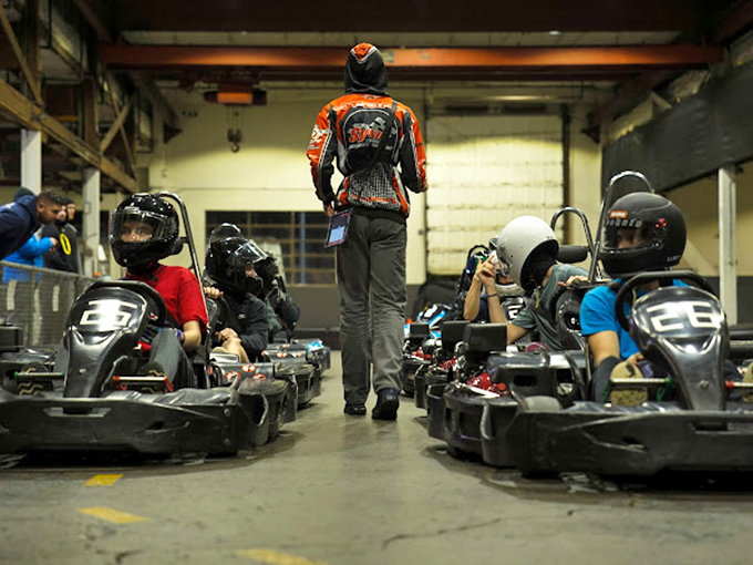 Pre-race jitters and focused determination. Like NASA mission control, but with more adrenaline and significantly less rocket science.