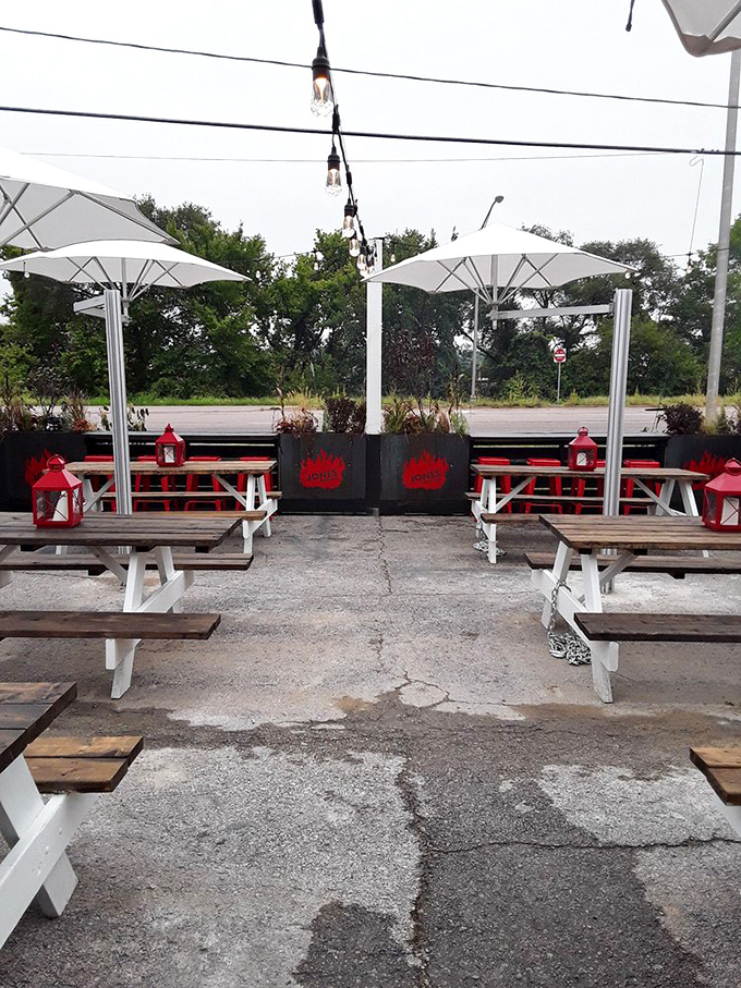 Picnic tables adorned with cheerful red lanterns create the perfect setting for the serious business of barbecue appreciation.