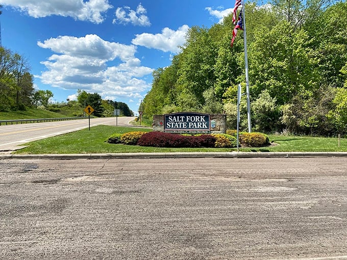 The entrance sign stands like a promise of adventure. After passing this marker, your blood pressure drops by at least 10 points.