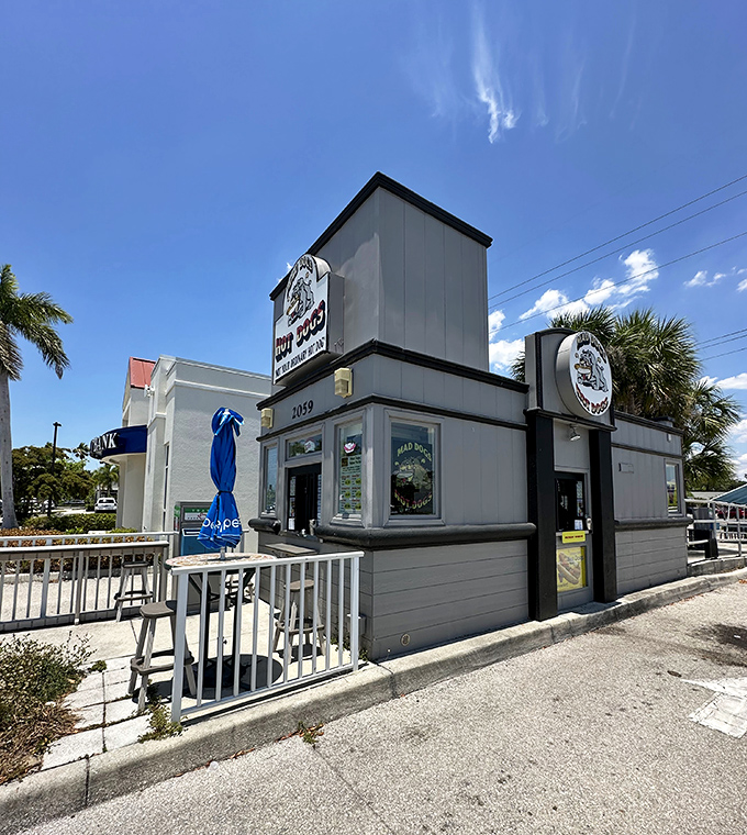 A simple gray structure standing tall against Florida's brilliant blue sky, Mad Dogs has the confidence of an establishment that lets its food do the talking.