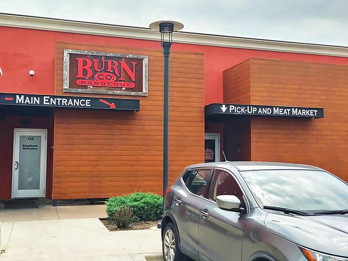 Burn Co's wooden facade and "Pick-Up and Meat Market" sign&mdash;like a treasure map where X marks the spot for brisket gold.