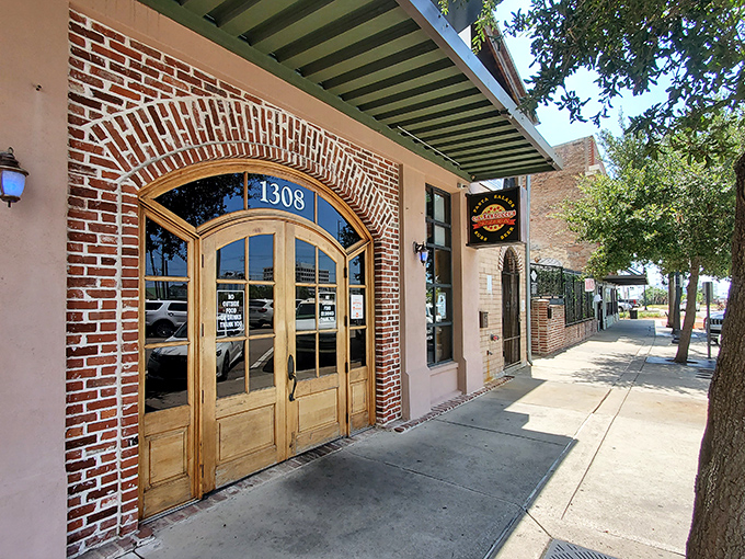 Sarducci's brick archway entrance feels like a portal to Naples. One step through those wooden doors and Mississippi disappears.