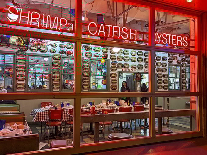 The neon glow of Flying Fish's window signs promises three essential food groups: shrimp, catfish, and oysters &ndash; the holy trinity of Memphis seafood salvation.