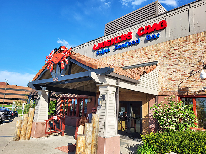 Laughing Crab's entrance promises what every seafood lover wants: a messy, delicious adventure.