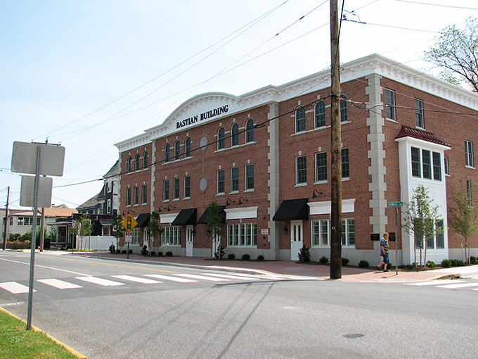 The historic Bastian Building stands proudly in Lewes, a red-brick testament to small-town architectural grandeur.