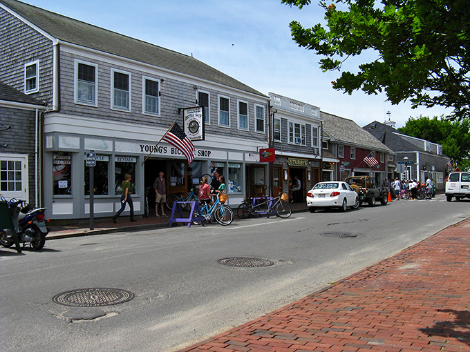 Young's Bike Shop anchors this Nantucket street where every shingle tells a story of salt air and island summers.