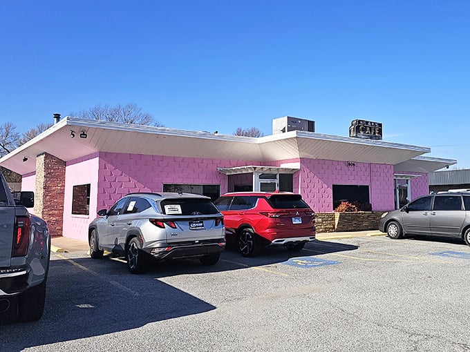 Neal's Cafe's pink exterior stands out like a flamingo at a business meeting&mdash;impossible to miss and guaranteed to improve your day.