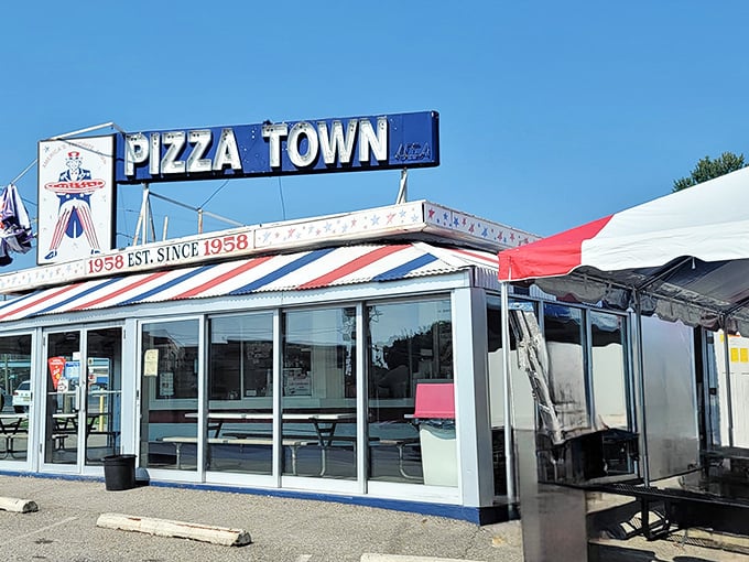 Pizza Town USA's patriotic awning isn't subtle, but neither is their commitment to old-school pizza perfection since the Eisenhower administration.