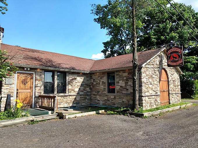 The stone cottage exterior of Red Wolfe Inn feels like stumbling upon a secret clubhouse where the password is "medium rare."