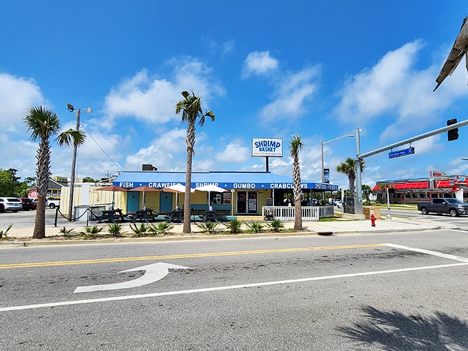 The Shrimp Basket's cheerful blue and yellow exterior is like a Jimmy Buffett song come to life&mdash;casual, coastal, and promising a good time.