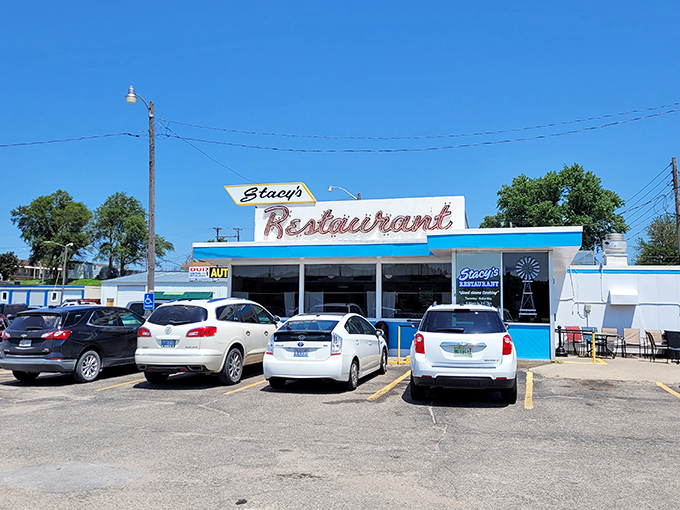 Stacy's Restaurant's classic blue trim and retro signage &ndash; where time travel comes with a side of hashbrowns.