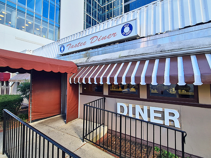 Tastee Diner's vintage silver exterior and striped awnings &ndash; where time travel is possible, one milkshake at a time.