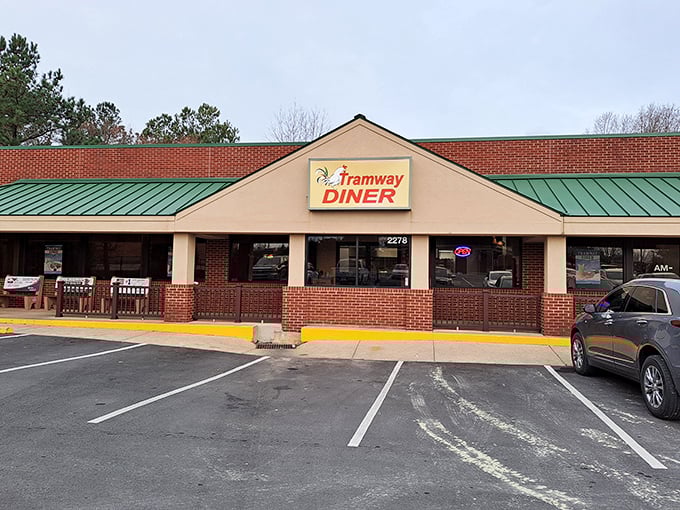 Tramway Diner exterior: Strip mall location, five-star comfort. Tramway's modest facade hides a wonderland of crispy-edged hash browns and life-changing country ham.