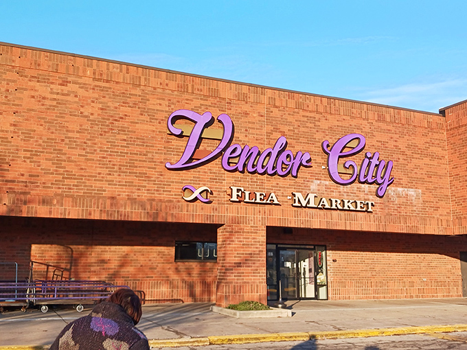 Purple royalty in a brick kingdom. Vendor City's sign promises an empire of finds where every booth feels like opening a time capsule.