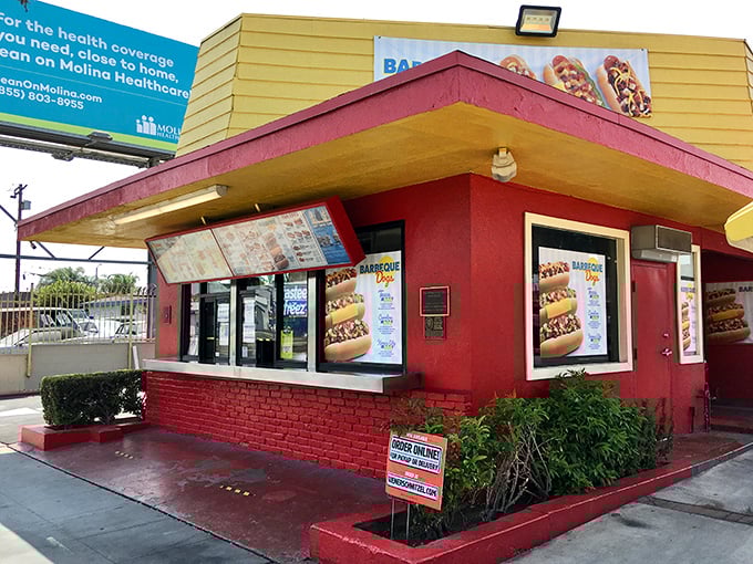 Wienerschnitzel's retro red-and-yellow charm beckons from the roadside like a time portal to simpler, more delicious days.