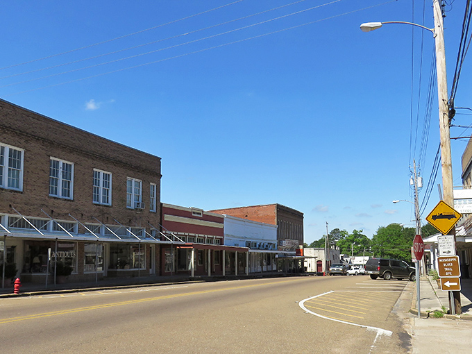 Woodville's main street whispers tales of yesteryear, where time moves slower and buildings stand proud since horse-and-buggy days