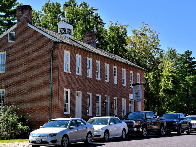 This brick beauty has witnessed centuries of history, standing tall while countless boots have worn smooth its wooden floors.
