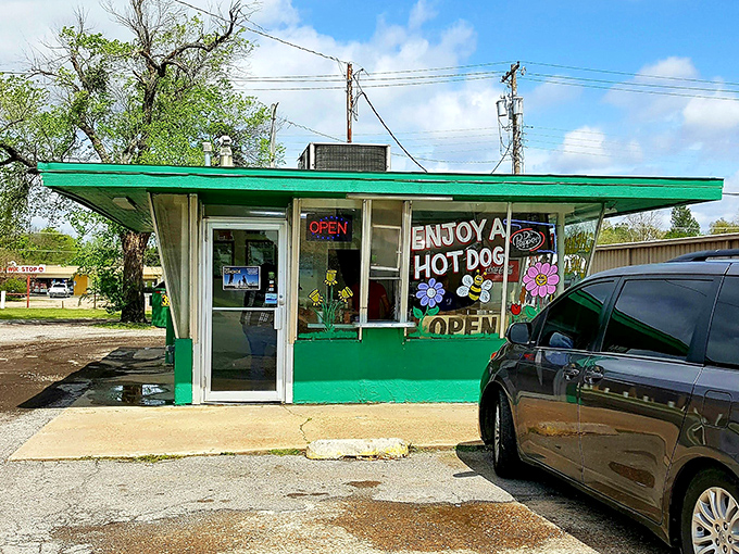 Hand-painted promises of "BEST HOT DOGS IN TOWN" that aren't just marketing &ndash; they're a mission statement in technicolor.
