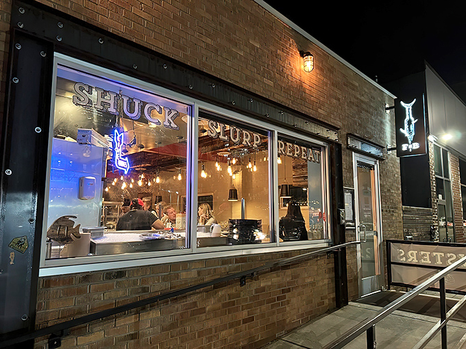 At night, Fish N Beer's warm glow beckons seafood lovers like a lighthouse calling ships to safe harbor.