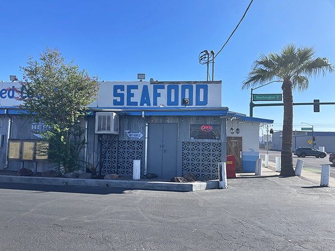 The corrugated metal exterior says "industrial warehouse," but the seafood inside whispers "coastal vacation" with every bite.