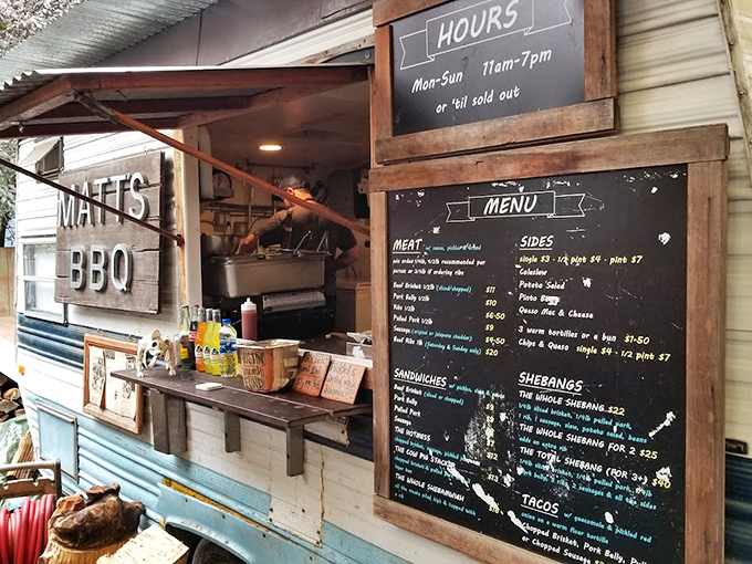 The menu board at Matt's tells a simple story: life-changing barbecue happens here. No fancy fonts needed when the brisket speaks volumes.