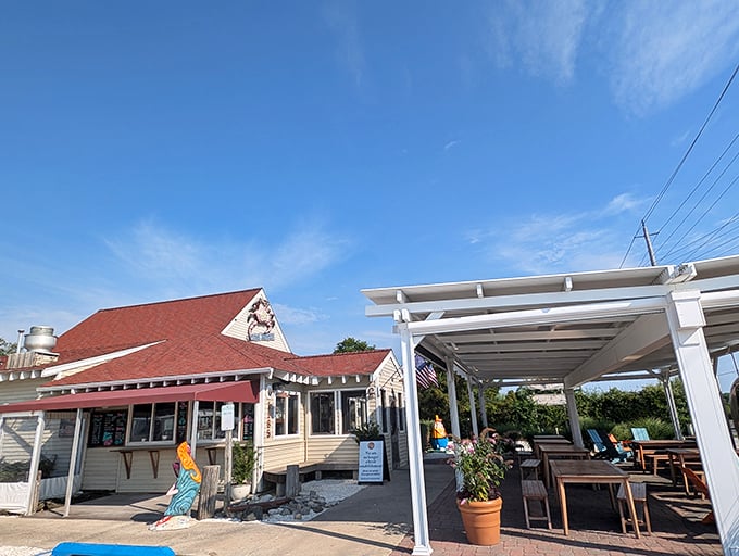 That pristine white pergola creates the perfect summer seafood setting. Blue skies, fresh air, and crab legs&mdash;what more could anyone ask for?