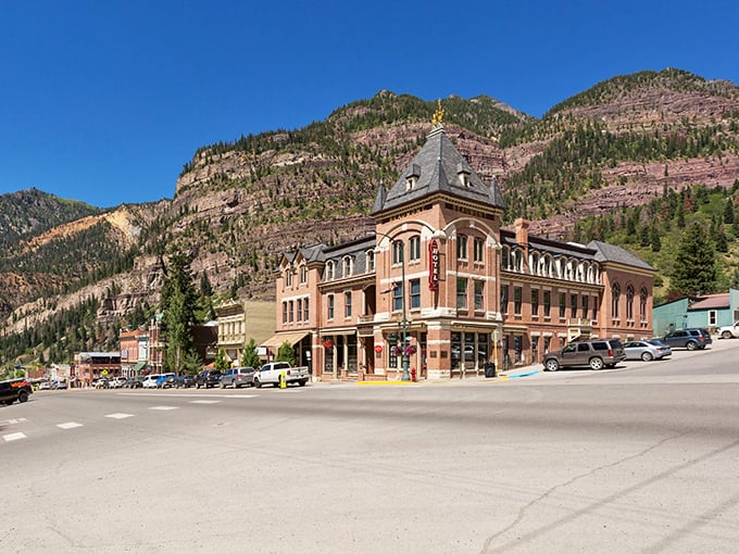 The red-brick charm of Ouray stands proud against mountain backdrops that make even non-hikers reach for their boots.
