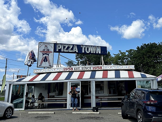 This red, white, and blue time capsule has been serving slices longer than most of us have been eating solid food.