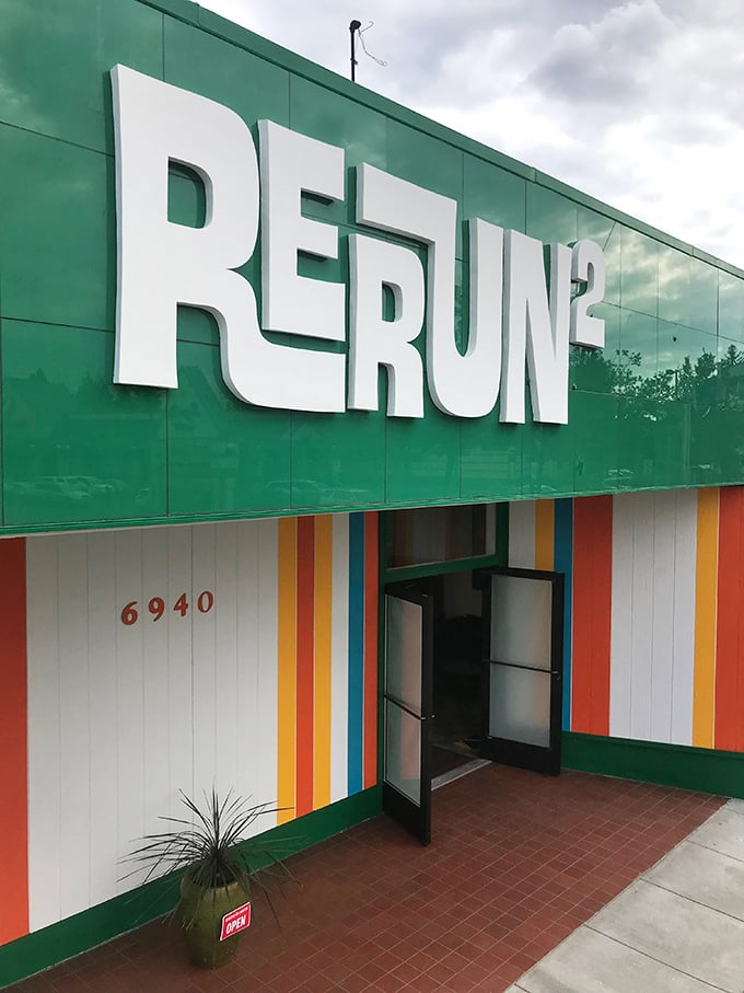 Behind those colorful stripes lies a carefully curated time machine where mid-century treasures await their second act.