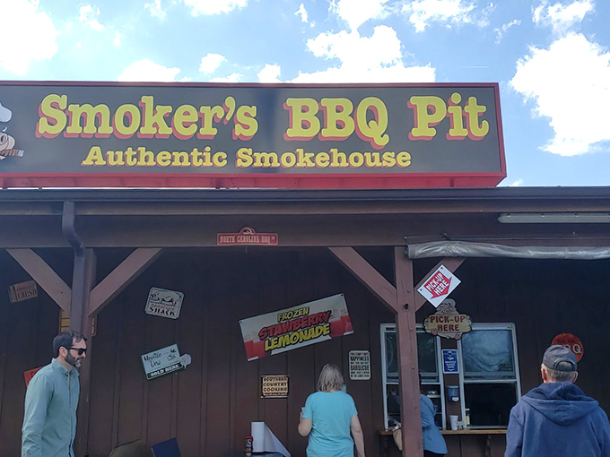 Smoker's BBQ Pit: The "Pick Up Here" sign might as well say "Life-Changing BBQ Collected Here." Follow your nose!