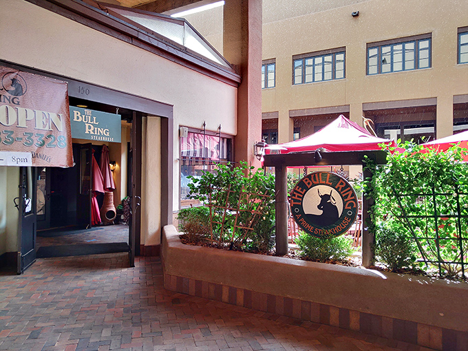The Bull Ring's charming entrance whispers "old Santa Fe" while promising aged prime beef that speaks volumes.