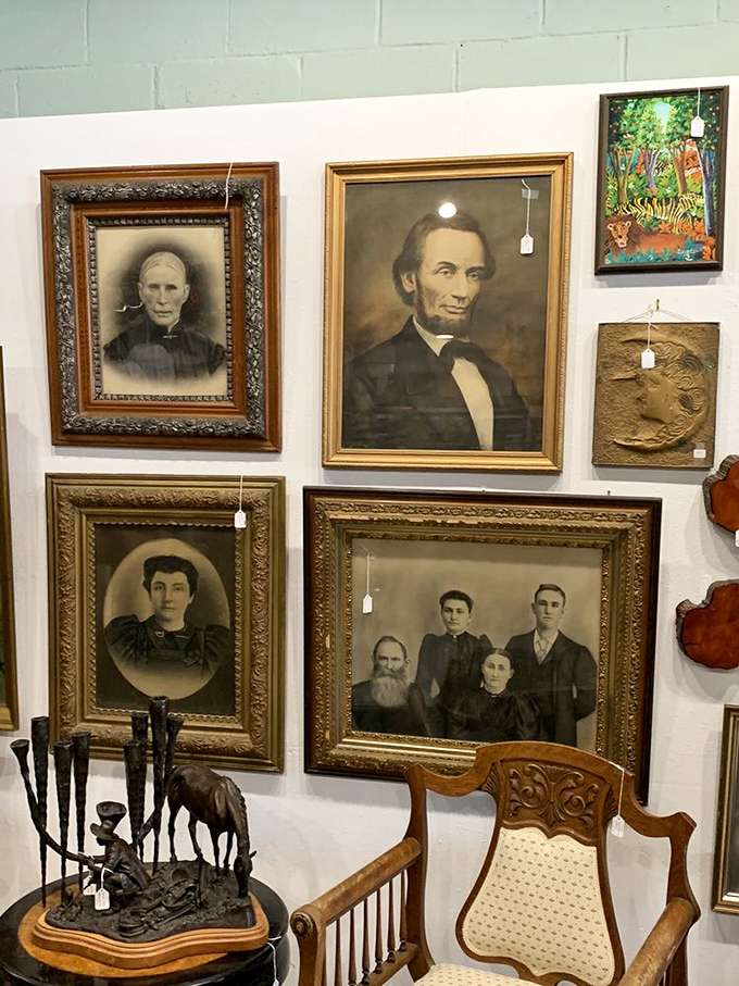 A gallery of faces from another era watches over shoppers. That Lincoln portrait alone would make any history buff weak in the knees.