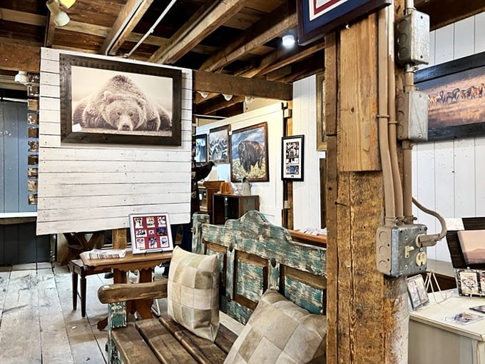 Wildlife photography meets rustic charm in this cozy nook. That bear looks how I feel before my morning coffee.
