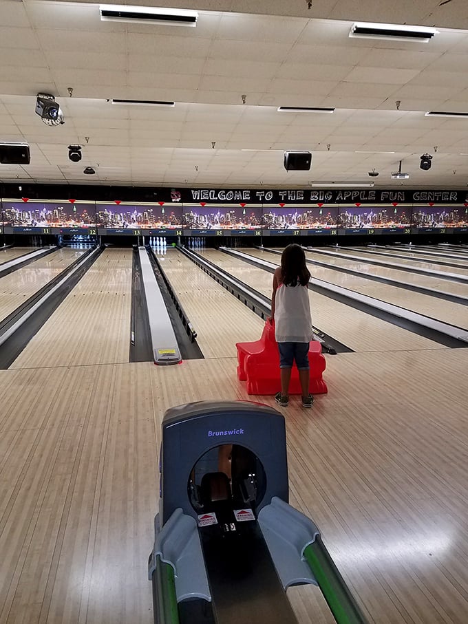 Brunswick lanes gleaming with possibility, where even a gutter ball comes with a laugh and another chance for glory.