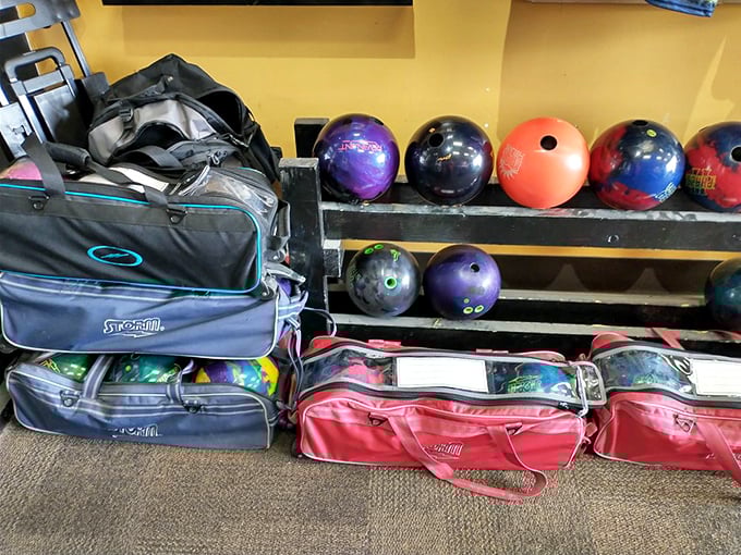 A rainbow arsenal of bowling weaponry awaits, each sphere promising the perfect strike&mdash;at least in your imagination.
