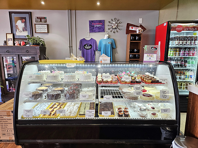 Decisions, decisions! The display case at Munchers is like the Louvre of pastries, but with significantly fewer tourists and more frosting.