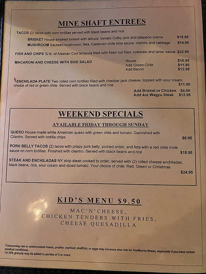 The menu reads like a love letter to New Mexican cuisine. Each dish promises a flavor journey worth every mile of that scenic Turquoise Trail drive.