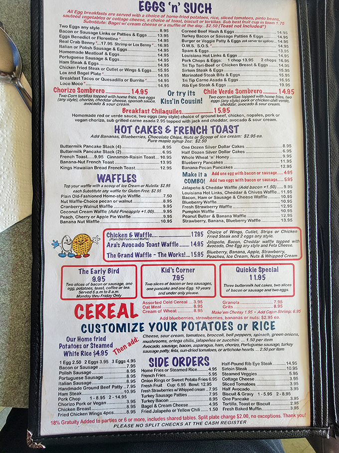 This menu isn't just reading material&mdash;it's a roadmap to happiness. The "Kiss'n Cousin" omelet alone deserves its own ZIP code.