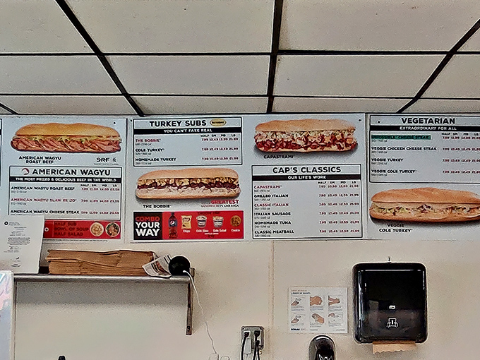 The menu board &ndash; a roadmap to culinary bliss. Like reading Shakespeare's sonnets, but with more roast beef and less iambic pentameter.