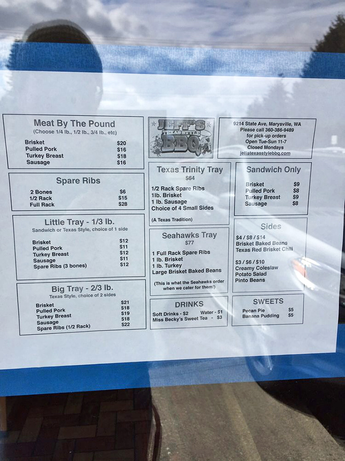 The menu reads like barbecue poetry&mdash;brisket, ribs, pulled pork. Notice the "Texas Trinity Tray"&mdash;a holy combination that would make even the most devout meat-lover speak in tongues.