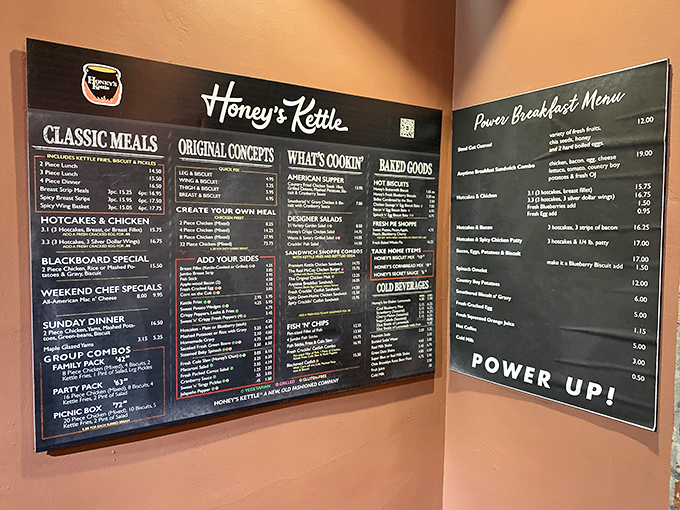 The menu board at Honey's Kettle reads like poetry to chicken lovers &ndash; each category a verse, each dish a delicious promise.