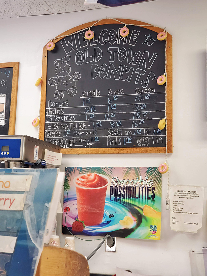 The chalkboard menu, adorned with tiny donut decorations, offers a roadmap to happiness at prices that won't require a second mortgage.