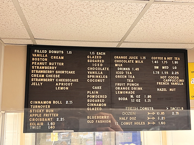 This menu board is like the Rosetta Stone of fried dough delights. Decode it early or miss out on the good stuff.