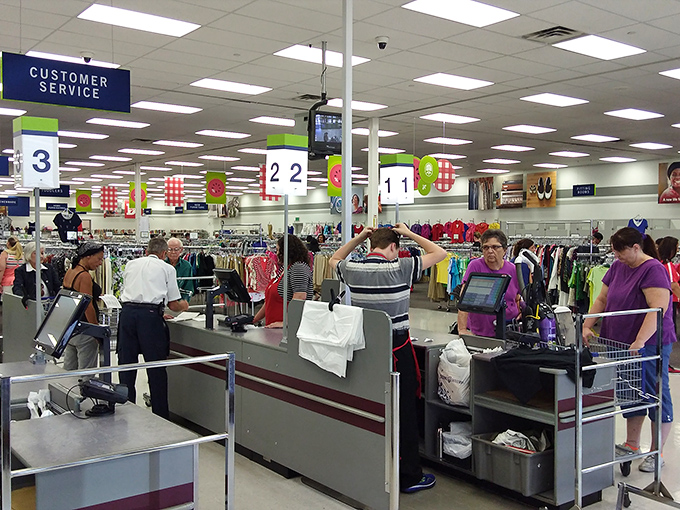 A colorful children's book stands sentinel among rows of literary treasures. One person's discard becomes another's bedtime story.